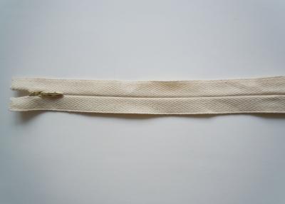 China Golden Metal Pull Custom Invisible Separating Zipper , Fabric Background Metal Separating Zipper for sale