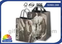 China Luxury Paperboard Custom Paper Shopping Bags with String Handle for Clothing Packaging for sale