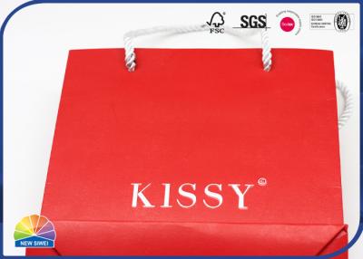 China Recycled Luxury Handle Glossy Kraft Paper Gift Bag With Custom Logo for sale