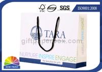 China Fancy Personalized Printing White Paper Bags with Long Cotton String Handle for sale