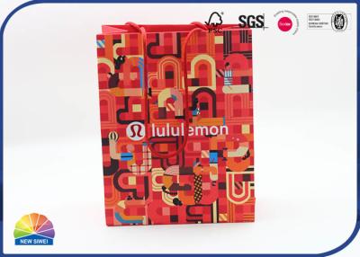 China CMYK 4C Printed Customized Paper Gift Bags Resuable Eco Friendly With Ribbon Handle for sale