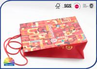 China CMYK 4C Printed Customized Paper Gift Bags Resuable Eco Friendly With Ribbon Handle for sale