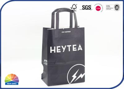 China 200gsm Customized 4C Print Kraft Paper Shopping Bags Gloss Varnishing With Handle for sale