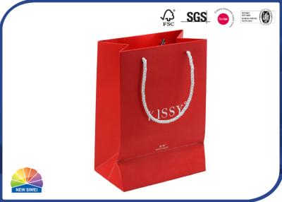 China Luxury Print 250gsm Art Paper Shopping Bags Silver Stamping With Nylon Rope Handles for sale