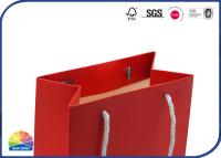 China Luxury Print 250gsm Art Paper Shopping Bags Silver Stamping With Nylon Rope Handles for sale
