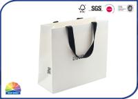 China Luxury Custom 200gsm Coated Retail Paper Shopping Bags With Handle Logo Print for sale