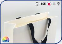 China Luxury Custom 200gsm Coated Retail Paper Shopping Bags With Handle Logo Print for sale