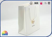 China Eco Friendly Paper Gift Packaging Bag Logo 4C Pritned With White Ribbon for sale