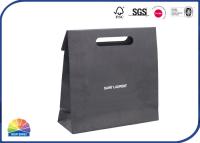 China Die Cut Handle Matte Paper Shopping Bags Adhesive Seal Cloth Packaging for sale