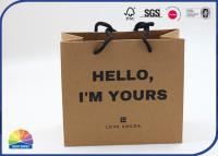 China 4C Customized Size Logo Kraft Paper Bags With Nylon Handle for sale
