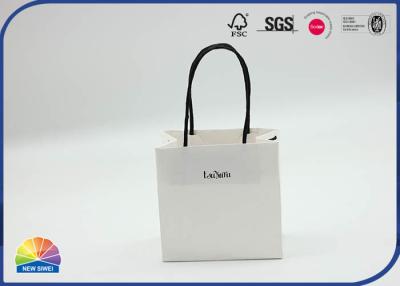 China 4c Printed Customized Logo White Kraft Paper Shopping Bag With Paper Handle for sale