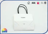 China 4c Printed Customized Logo White Kraft Paper Shopping Bag With Paper Handle for sale