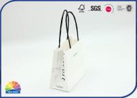 China 4c Printed Customized Logo White Kraft Paper Shopping Bag With Paper Handle for sale
