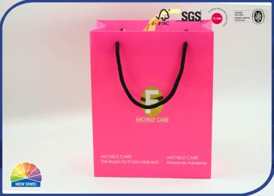 China 350g Coated Paper Shopping Paper Gift Bags Customized Logo With Nylon Handle for sale