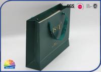 China 350g Green Coated Shopping Paper Gift Bags Customized Logo With Silk Handle for sale
