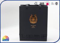 China Black Customized Lion Logo Paper Gift Bag Gold Hot Stamping With Silk Handle for sale