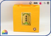 China Eco Friendly 250gsm Coated Paper Gift Shopping Bags Orange Color Matt Lamination for sale
