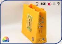 China Eco Friendly 250gsm Coated Paper Gift Shopping Bags Orange Color Matt Lamination for sale