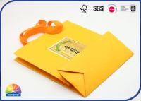 China Eco Friendly 250gsm Coated Paper Gift Shopping Bags Orange Color Matt Lamination for sale