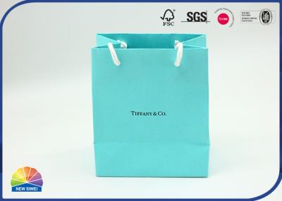 China Embossing Matte Lamination Special Reusable Paper Bag Customized Logo With Handle for sale