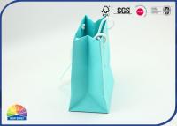 China Embossing Matte Lamination Special Reusable Paper Bag Customized Logo With Handle for sale
