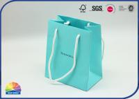China Embossing Matte Lamination Special Reusable Paper Bag Customized Logo With Handle for sale
