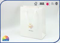 China Eco Friendly 4C Print Customized Size Paper Gift Bag With Nylon Handle for sale