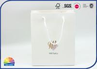 China Eco Friendly 4C Print Customized Size Paper Gift Bag With Nylon Handle for sale