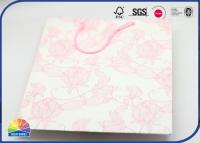 China Customized Size Logo Eco Friendly Folding Coated Paper Bag With Handle for sale