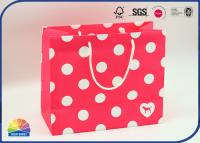 China Customized Size Logo Varnishing Paper Shopping Bag With Nylon Handle for sale