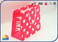 China Customized Size Logo Varnishing Paper Shopping Bag With Nylon Handle for sale