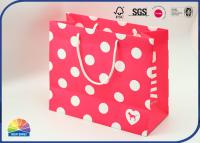China Customized Size Logo Varnishing Paper Shopping Bag With Nylon Handle for sale