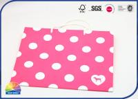 China Customized Size Logo Varnishing Paper Shopping Bag With Nylon Handle for sale