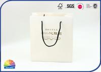 China Printed Customized Logo Paper Gift Bag For Luxury Product With Handle for sale