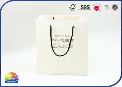 China Printed Customized Logo Paper Gift Bag For Luxury Product With Handle for sale