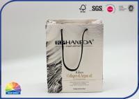 China Custom Paper Shopping Bags With Nylon Handle Matte Lamination for sale