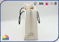 China Custom Logo Paper Shopping Bags Luxury Boutique Gift Paper Bag With Handle for sale
