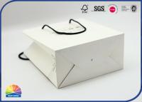 China Custom Logo Paper Shopping Bags Luxury Boutique Gift Paper Bag With Handle for sale