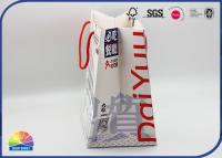 China Luxury Apparel Gift Paper Shopping Bags With Nylon Twisted Shoe Buckle Handle for sale