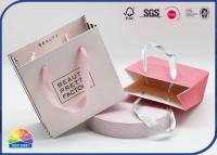 China Pink Printing Present Package Paper Shopping Bags With Ribbon Handles for sale