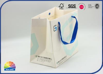 China White Coated Paper Shopping Bags Custom Size Matte Lamination With Blue Handle for sale