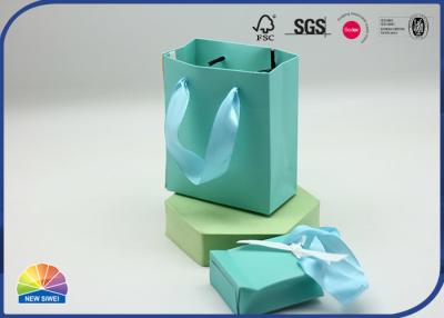 China 4c Print Customized Jewelry Packaging Paper Shopping Bags With Handle for sale