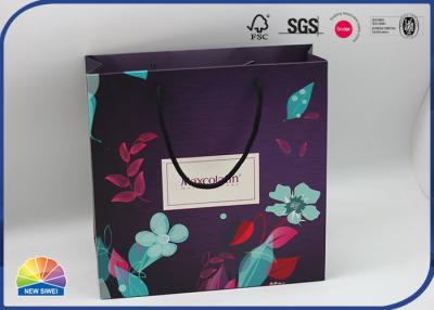 China 4C Printed Paper Packaging Special Bag Matte Lamination With Nylon Handle for sale