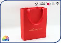 China Gold Stamping Logo Paper Gift Bag Bright Red Color For Holiday Gifts Packaging for sale