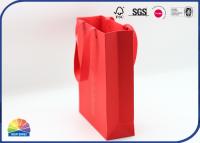 China Gold Stamping Logo Paper Gift Bag Bright Red Color For Holiday Gifts Packaging for sale