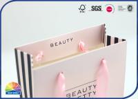 China Custom Color Luxury Printed Paper Shopping Gift Bags With Nylon Handle Ropes for sale