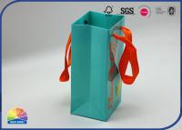 China Eco Friendly Pantone Print Green Paper Gift Shopping Bag With Orange Handle for sale