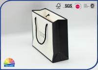 China Matte Laminated 290gsm Coated Paper Gift Bag Custom Shape Handle Eco Friendly for sale