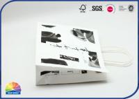 China 210gsm White Kraft Paper Gift Bag CMYK Print Customized With Handle for sale