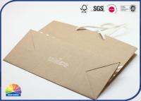 China Brown Printed Kraft Paper Gift Bag Package With Knotted Handle for sale
